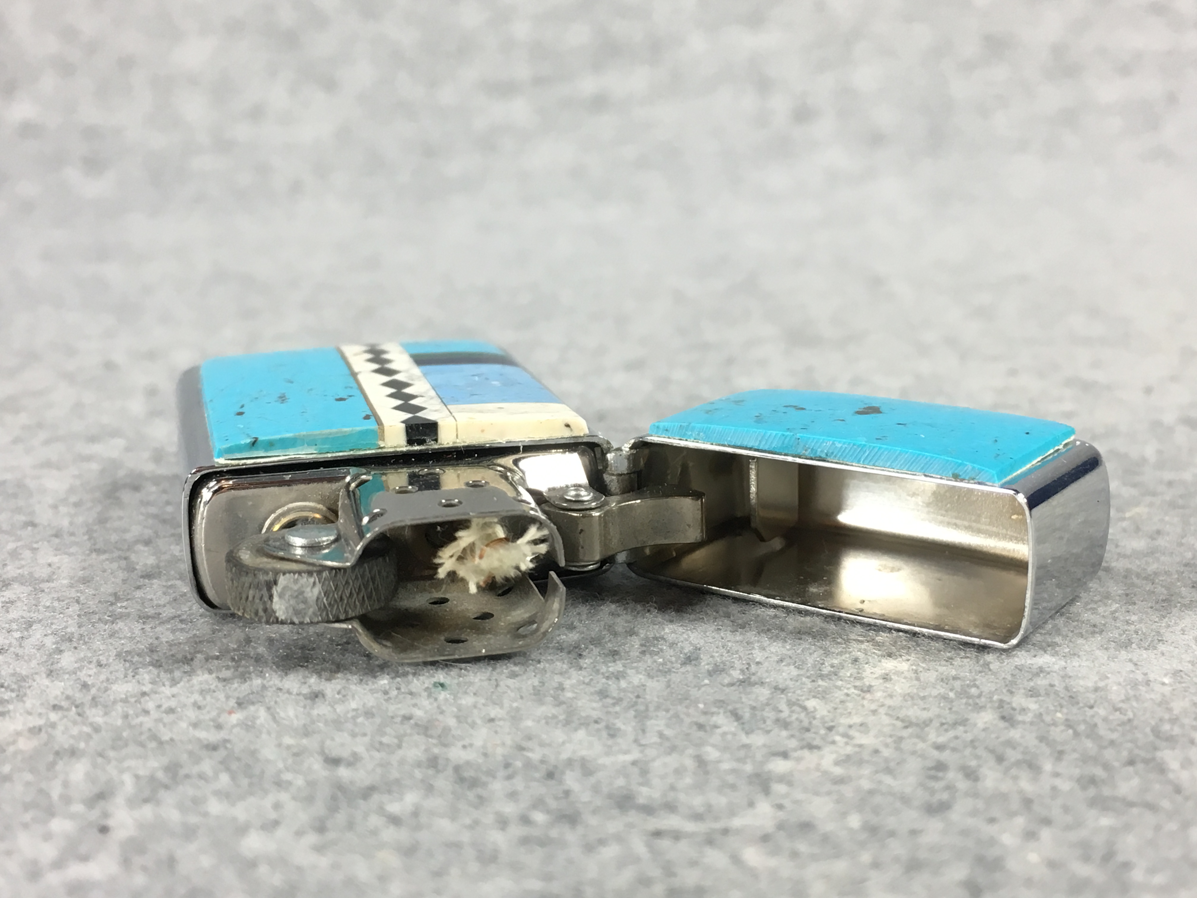 How much is ZIPPO TURQUOISE EMBLEM Polished Chrome Slim Lighter (Zippo, 1996) worth? | iGuide ...