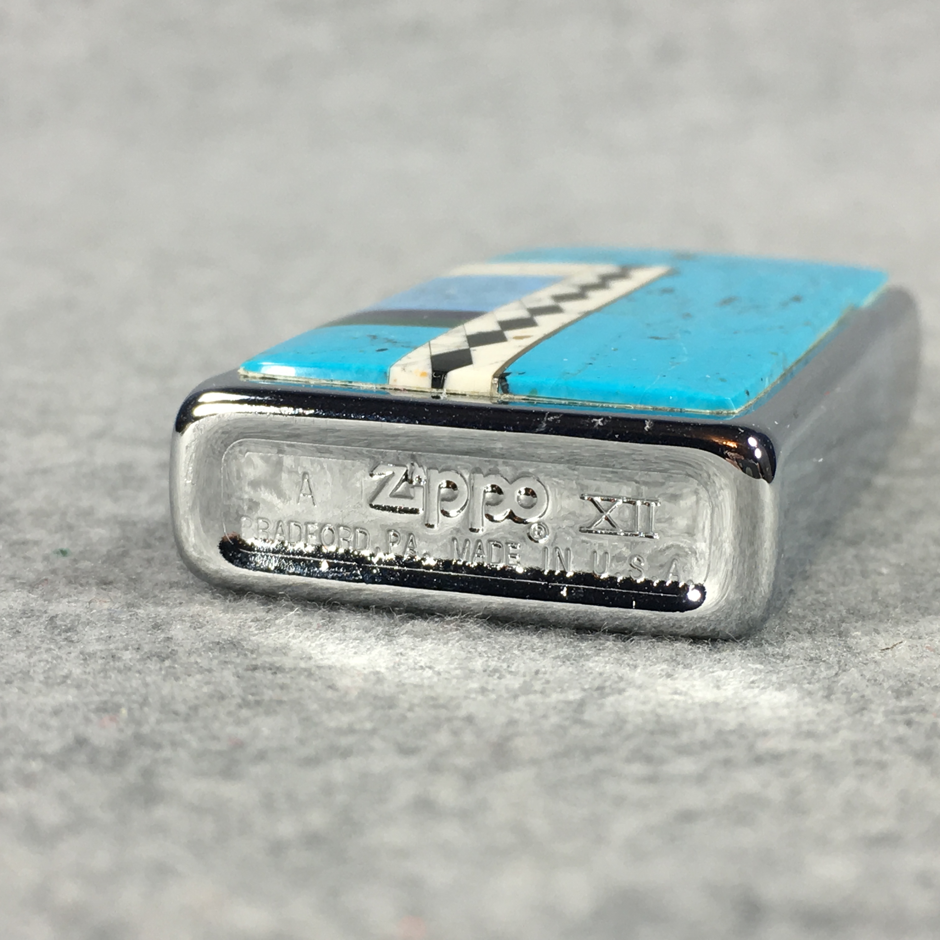 How much is ZIPPO TURQUOISE EMBLEM Polished Chrome Slim Lighter (Zippo, 1996) worth? | iGuide ...
